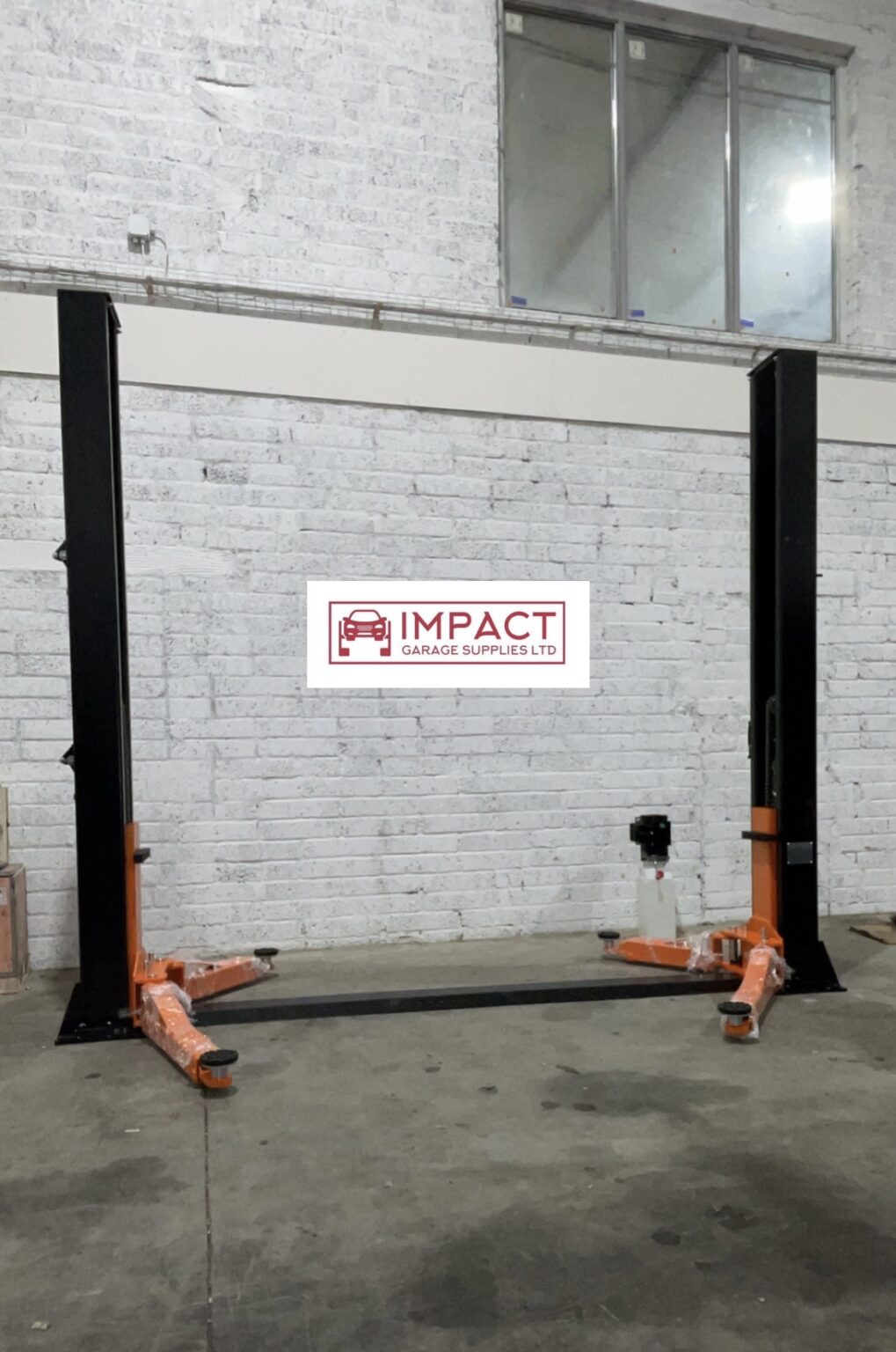 Buy Manual Lock Two Post Lift – 4T Baseplate - Impact Garage Supplies